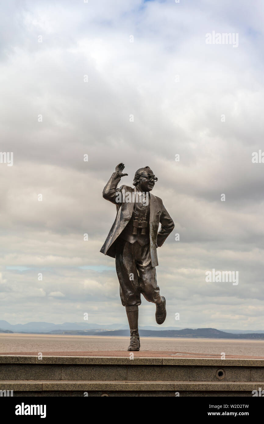 Bronze statue of famous English comedian Eric Morecambe at the seafront ...