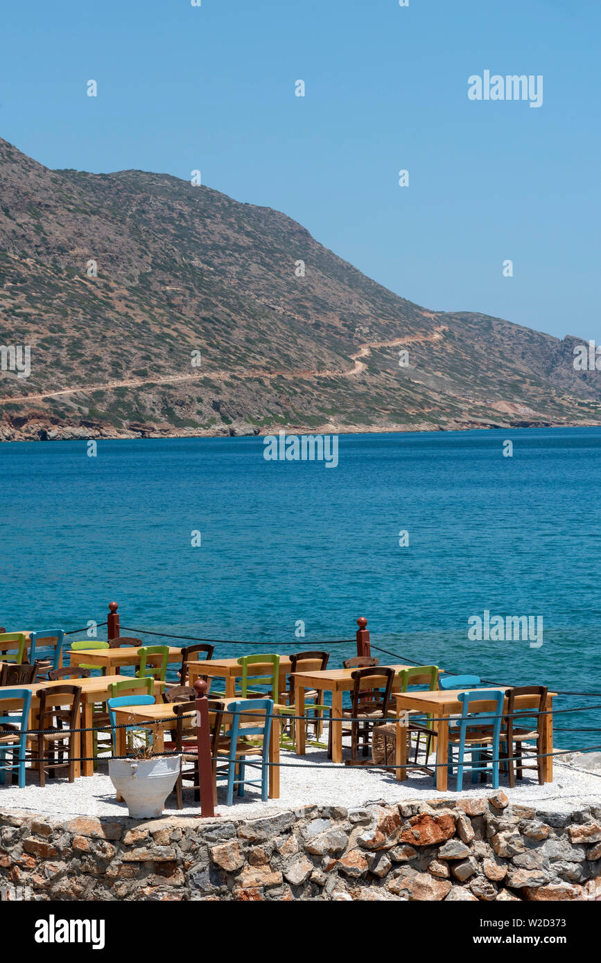 Plaka, Crete, Greece. June 2019. Tables and chairs all empty on the ...