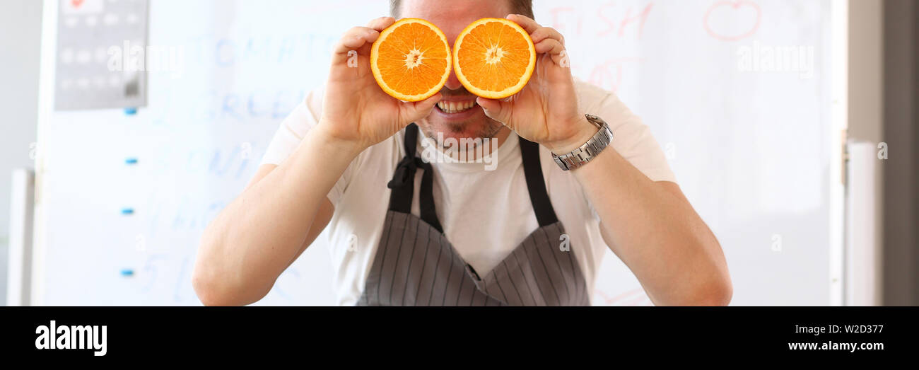 Chef Vlogger Showing Comic Orange Citrus Eye Stock Photo - Alamy
