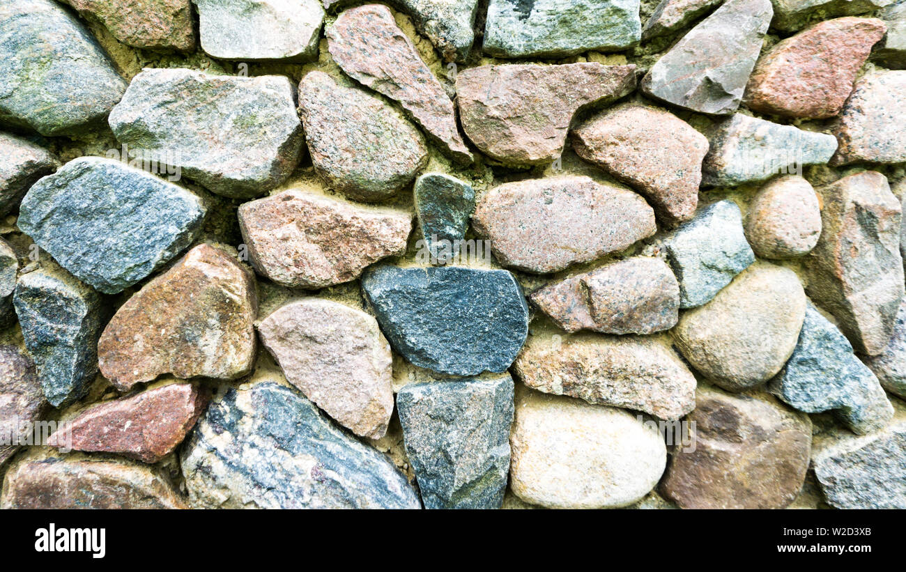 wall made of natural stones Stock Photo - Alamy
