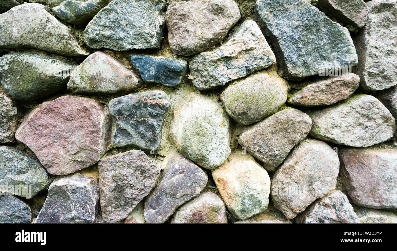 wall made of natural stones Stock Photo - Alamy