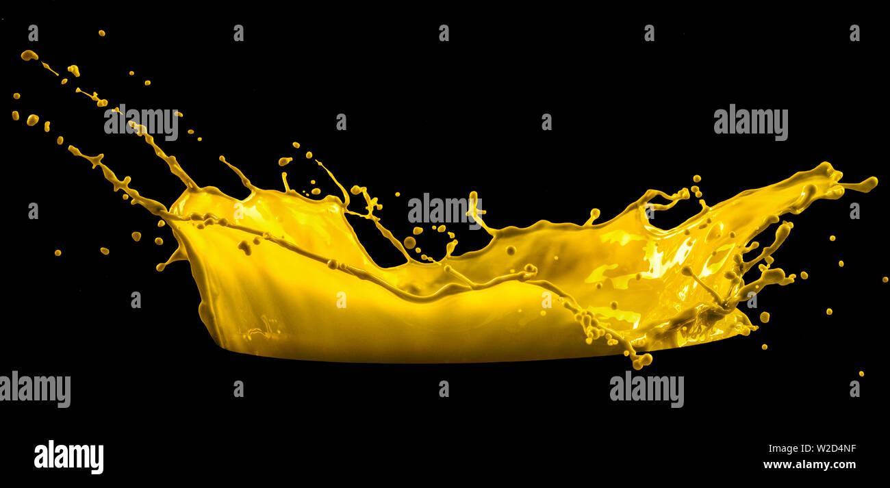 yellow paint splash isolated on black background Stock Photo - Alamy