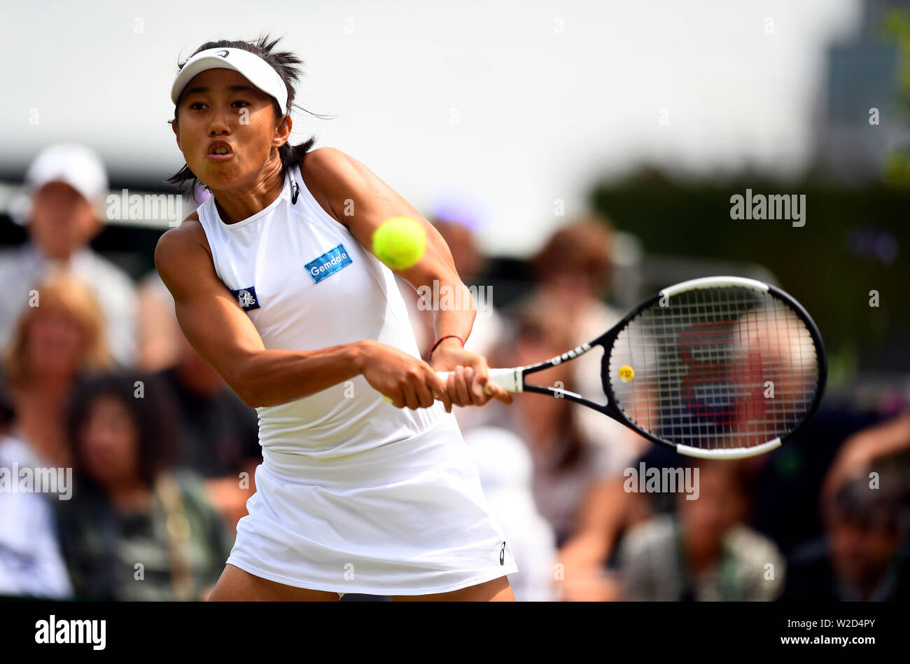 Shuai Zhang in action on day seven of the Wimbledon Championships at ...
