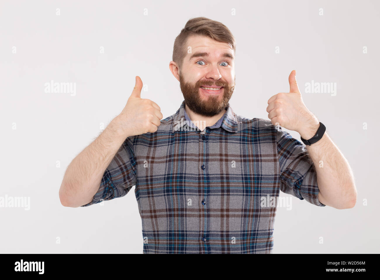 Success and good gesture concept - happy funny man showing thumbs up on ...