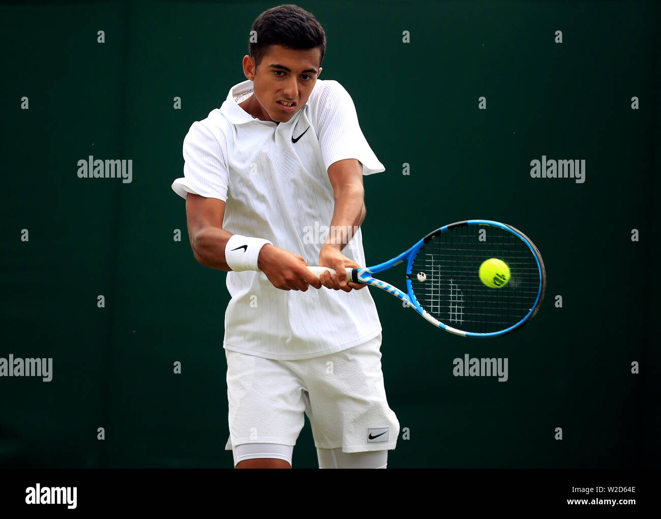 Nicolas Alvarez Varona in action against Felix Gill in the boys singles ...