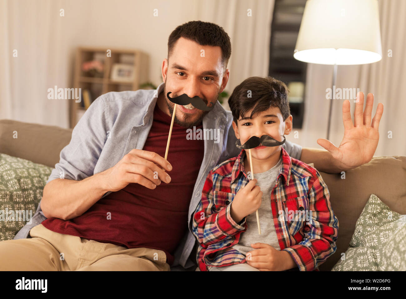 father and son with mustaches having fun Stock Photo - Alamy