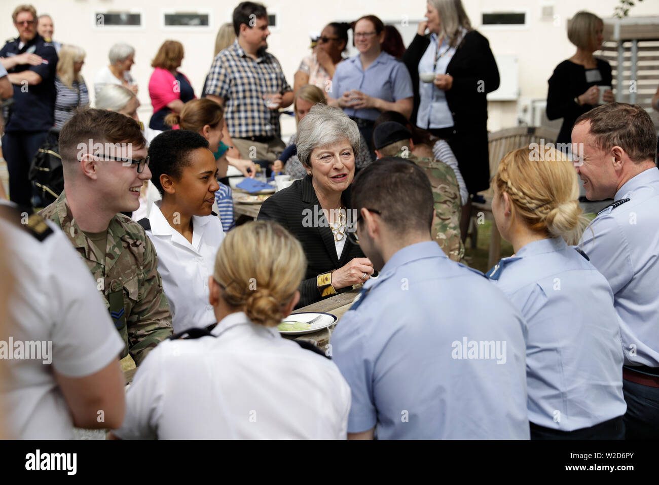 Prime Minister Theresa May meets military service personnel and their ...