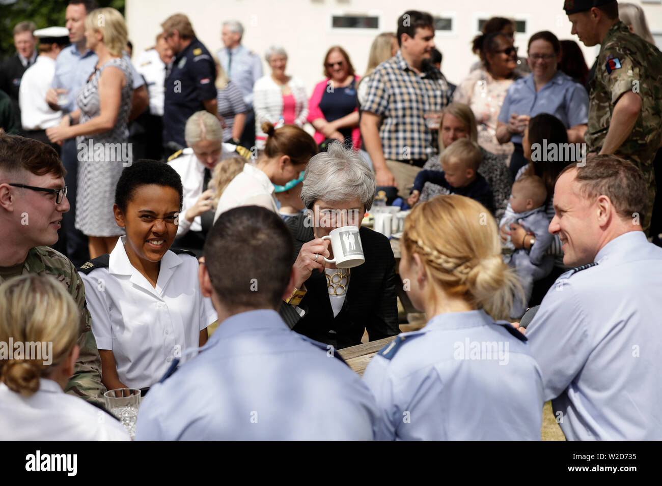 Prime Minister Theresa May meets military service personnel and their ...