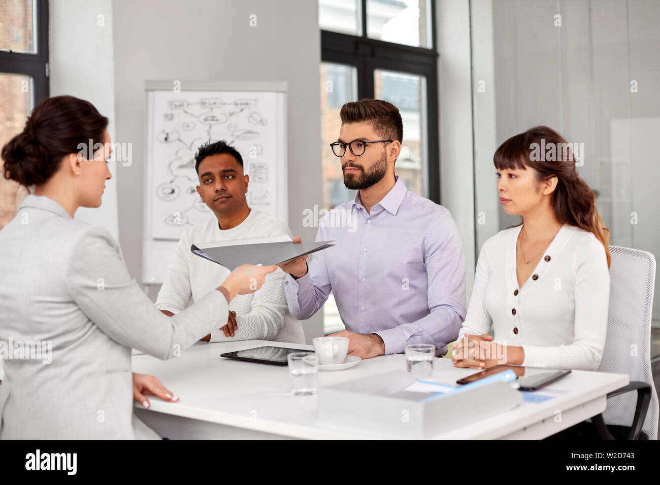 recruiters having job interview with employee Stock Photo - Alamy