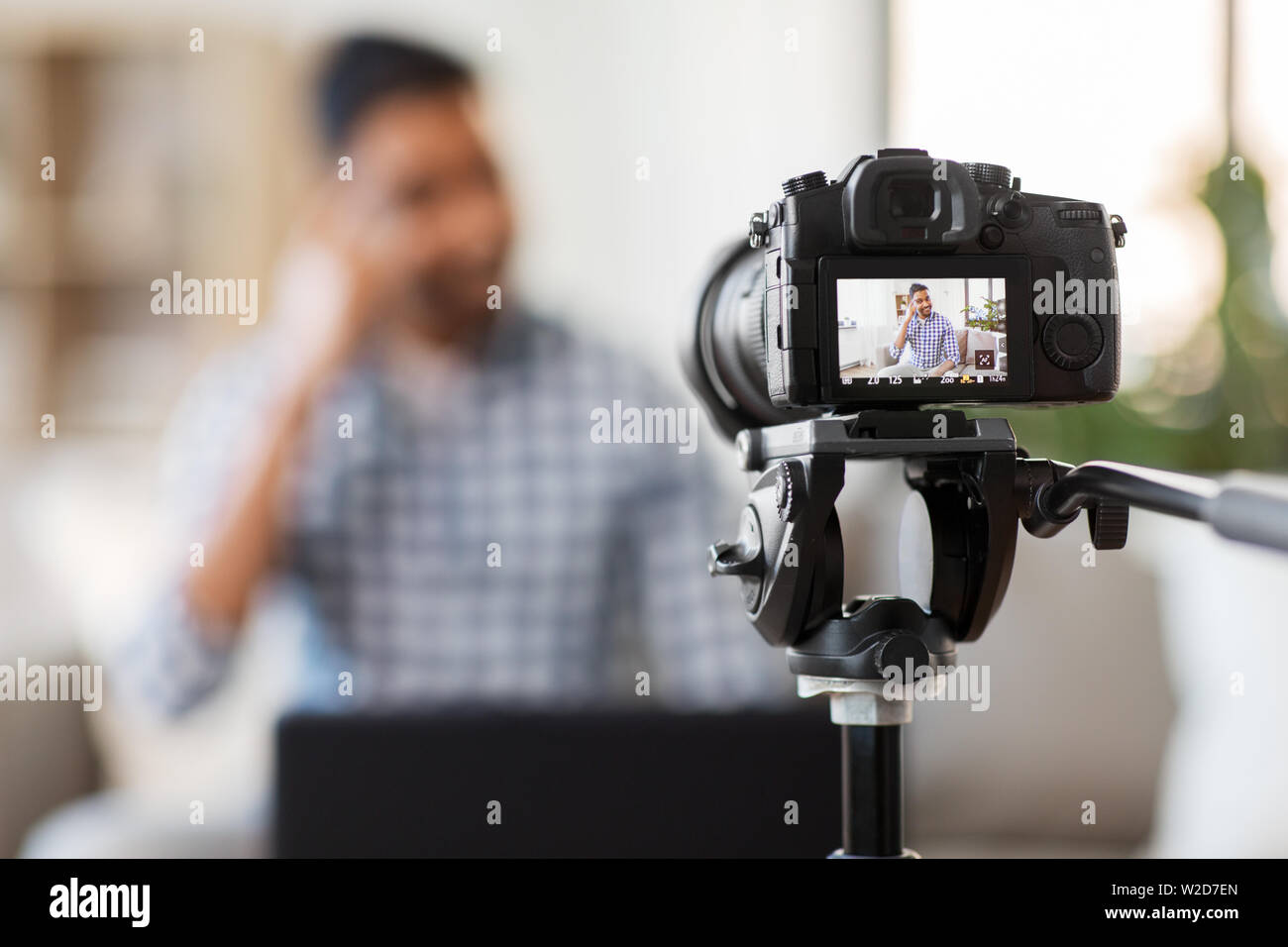 camera recording video blog of indian male blogger Stock Photo - Alamy
