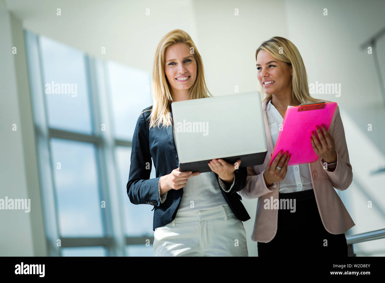Business people look at computer hi-res stock photography and images ...