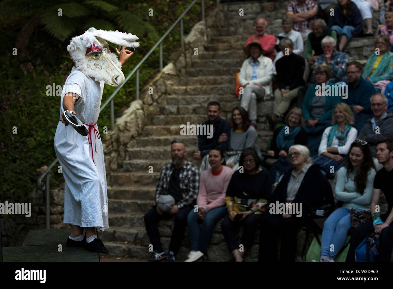 Audience watching an actor performing in Shakespeare's ‘A Midsummer ...