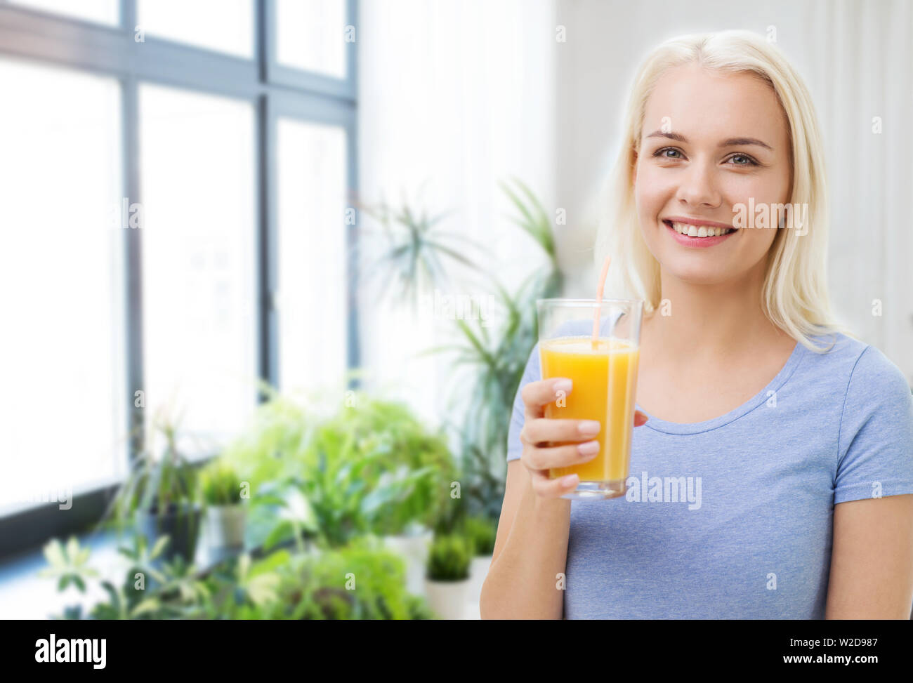 Woman juice drink hi-res stock photography and images - Alamy