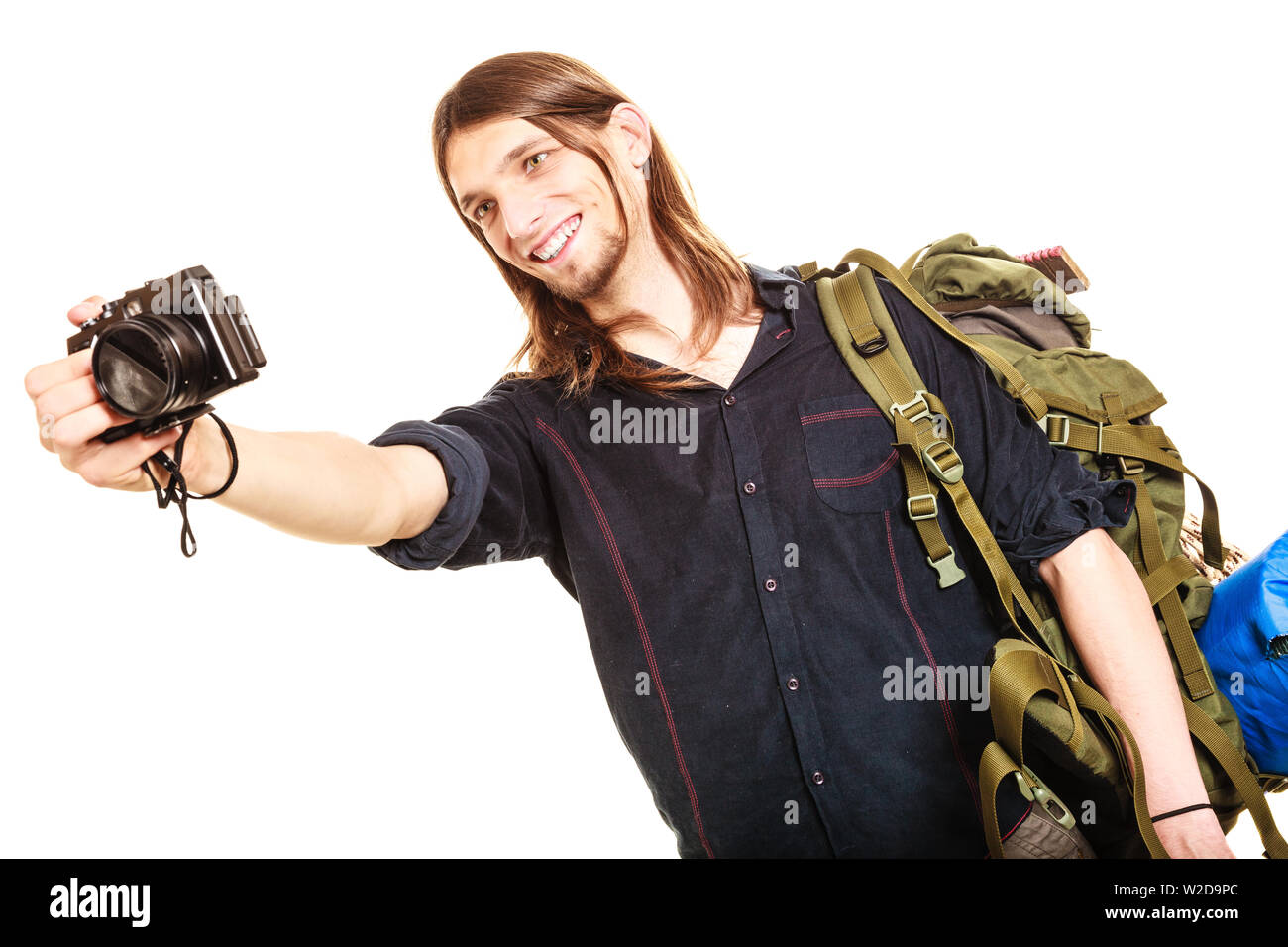Man tourist backpacker taking photo picture with camera. Young guy ...