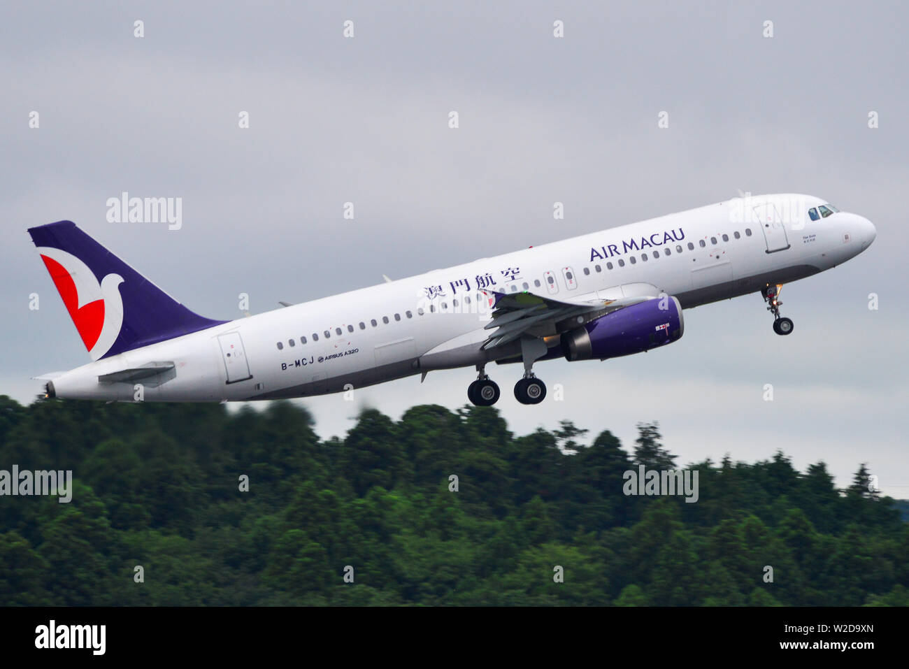 Tokyo, Japan - Jul 4, 2019. B-MCJ Air Macau Airbus A320 taking off from ...