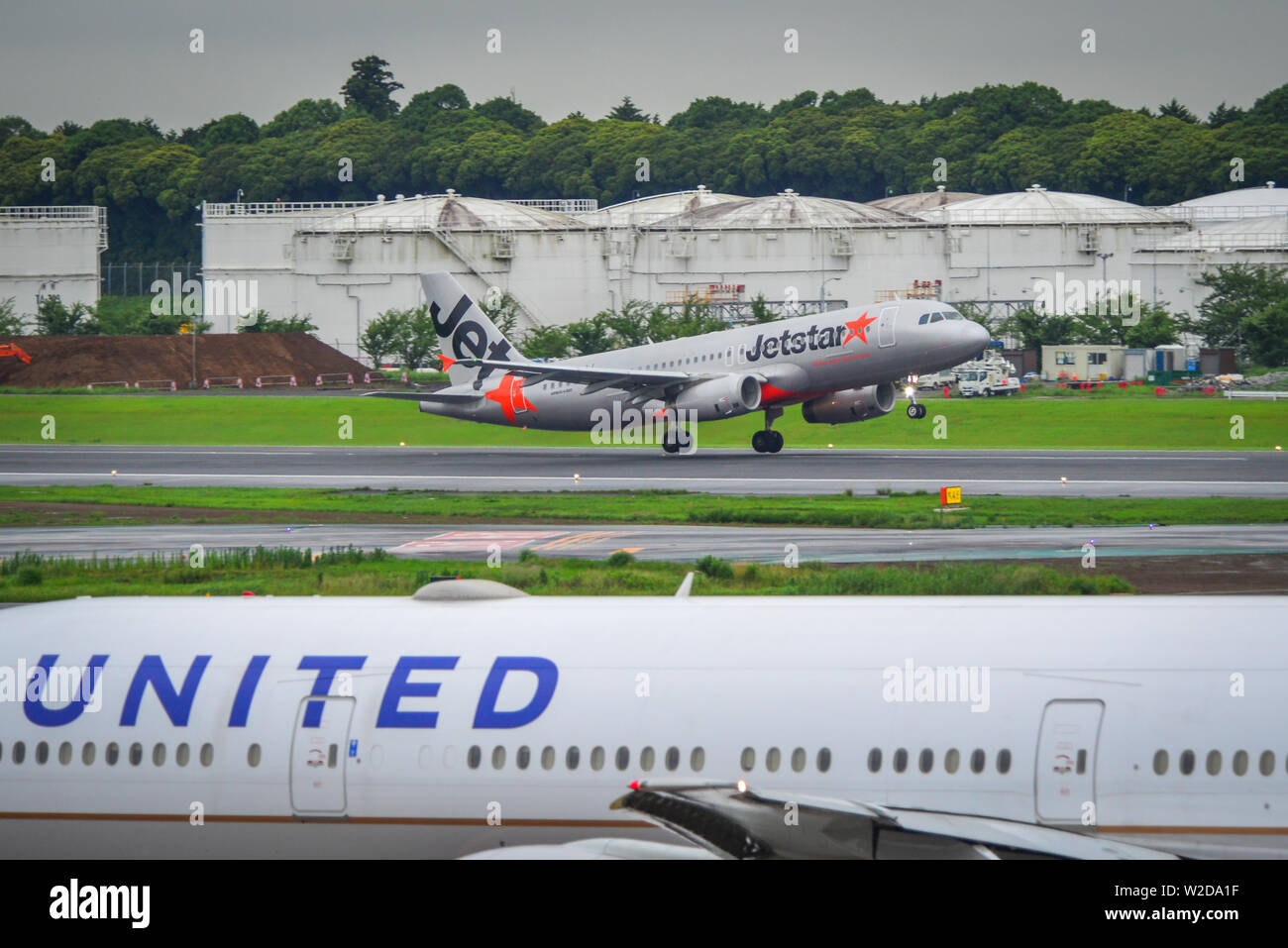 Tokyo, Japan - Jul 4, 2019. Passenger airplanes at Narita Airport (NRT ...
