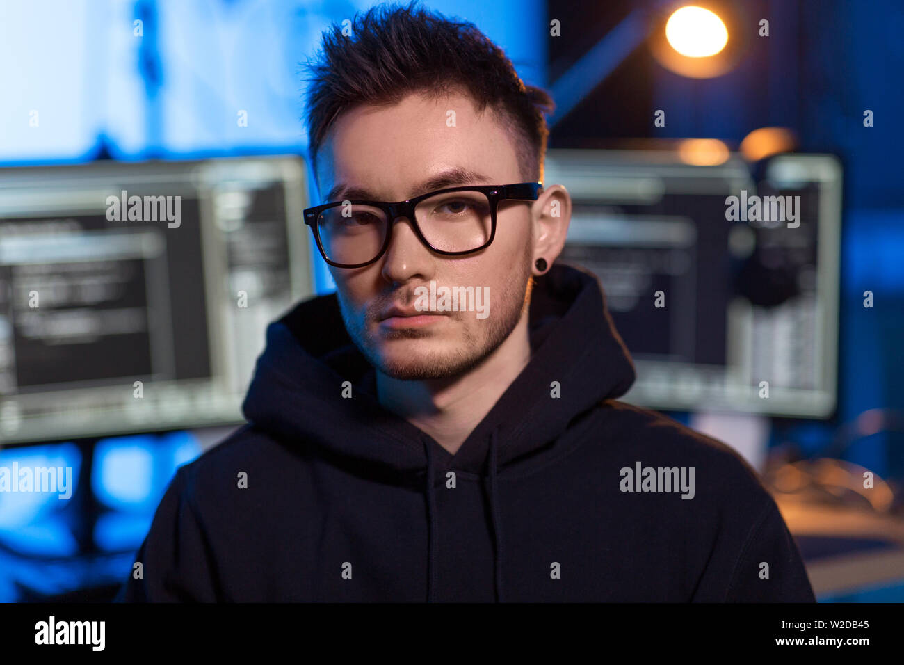 Asian hacker in glasses hi-res stock photography and images - Alamy