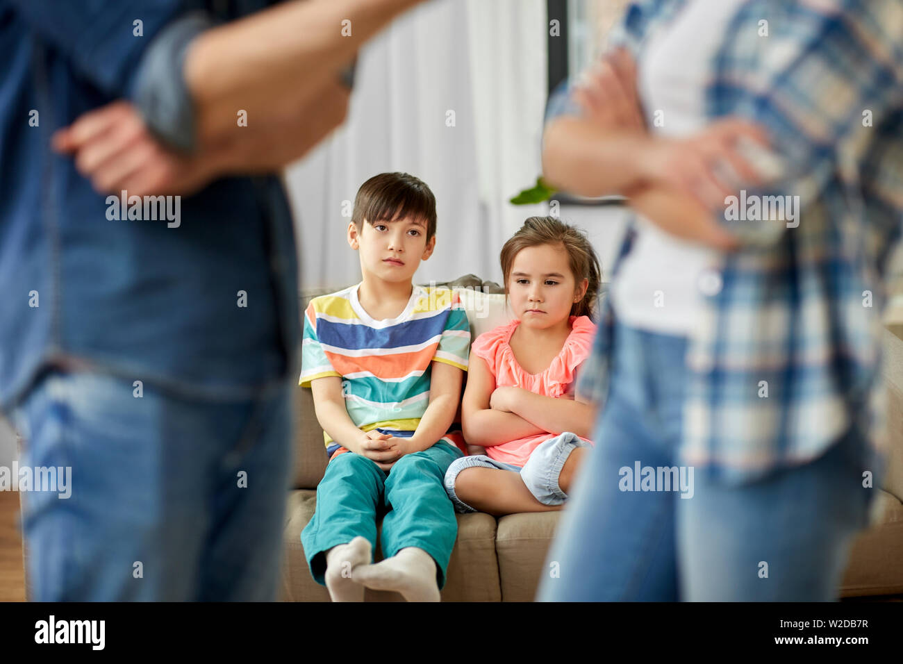 Child watching parents argue hi-res stock photography and images - Alamy