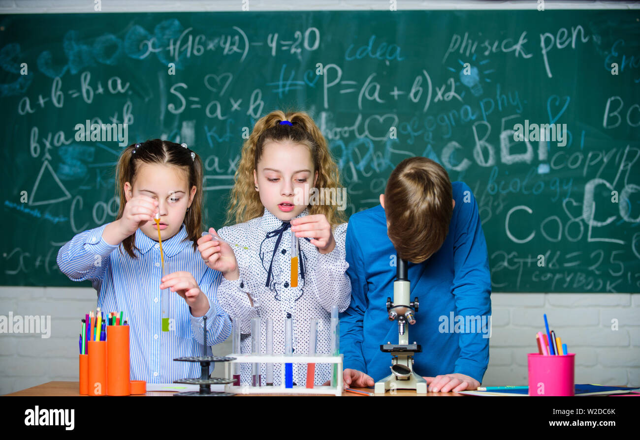 students biology experiments with microscope in lab. Chemistry ...