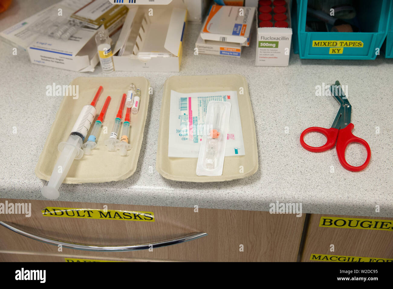 Syringes laid out in preparation room hi-res stock photography and ...