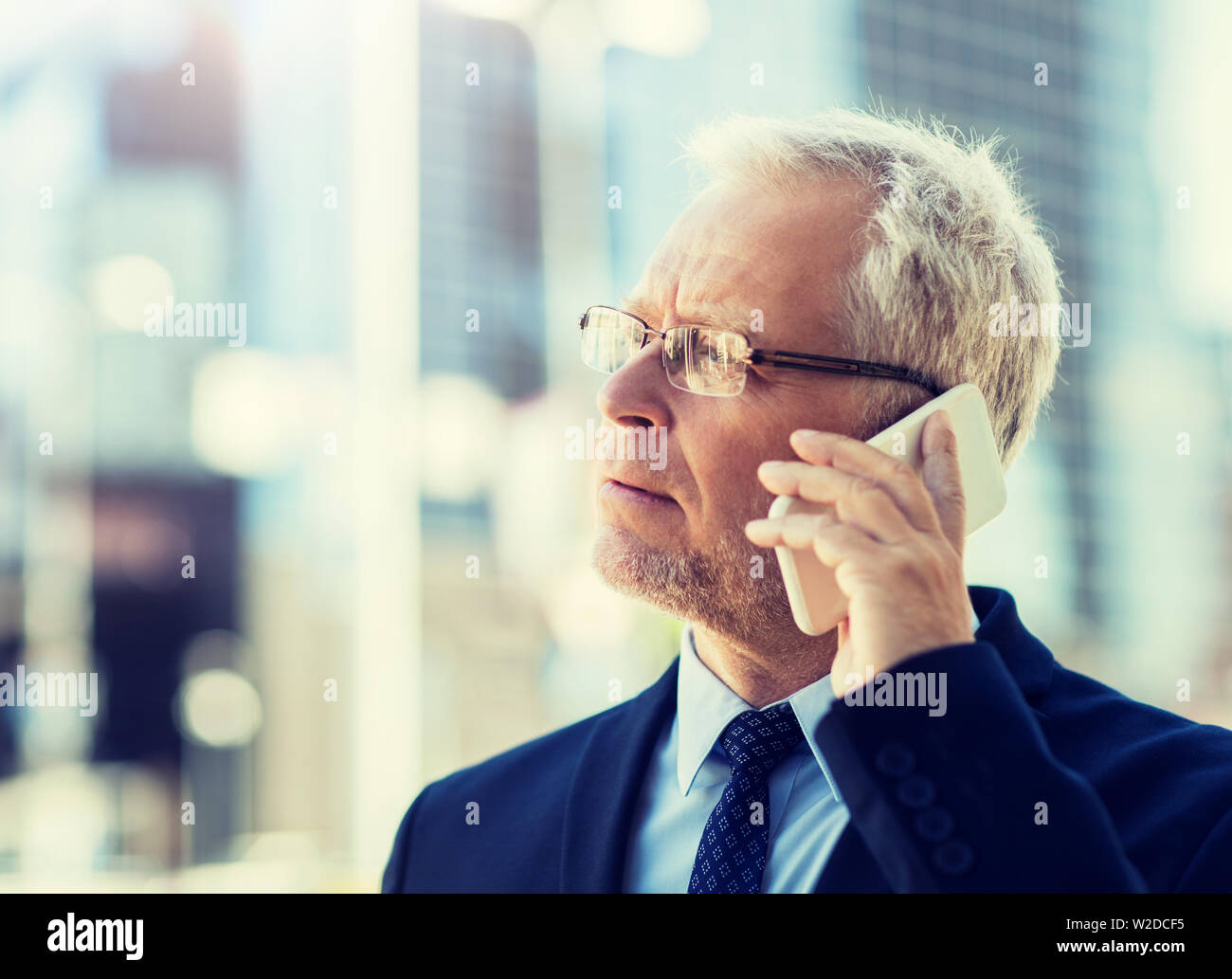 Mature businessman making call in hi-res stock photography and images ...