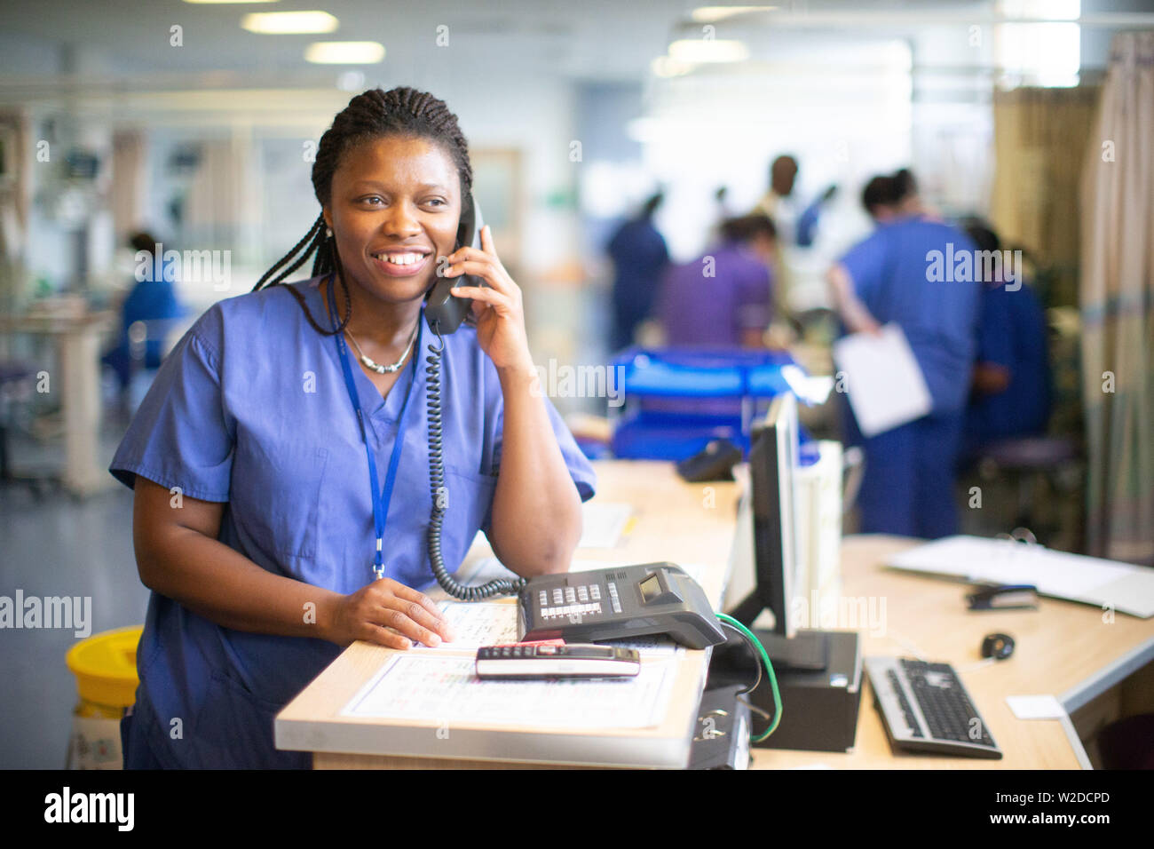 Nhs staff at a workstation hi-res stock photography and images - Alamy