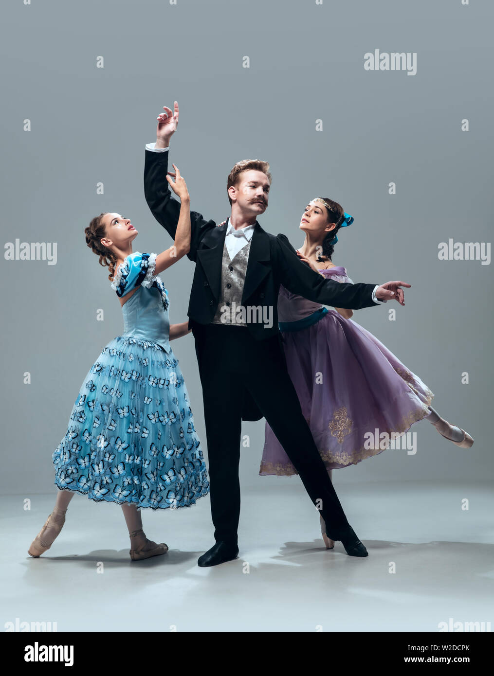 Beauty and grace. Beautiful contemporary ballroom dancers isolated on ...