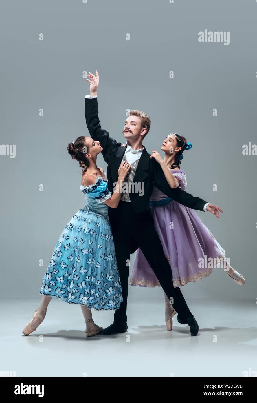 Beauty and grace. Beautiful contemporary ballroom dancers isolated on ...