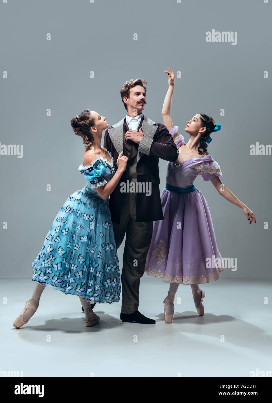 Beauty and grace. Beautiful contemporary ballroom dancers isolated on ...