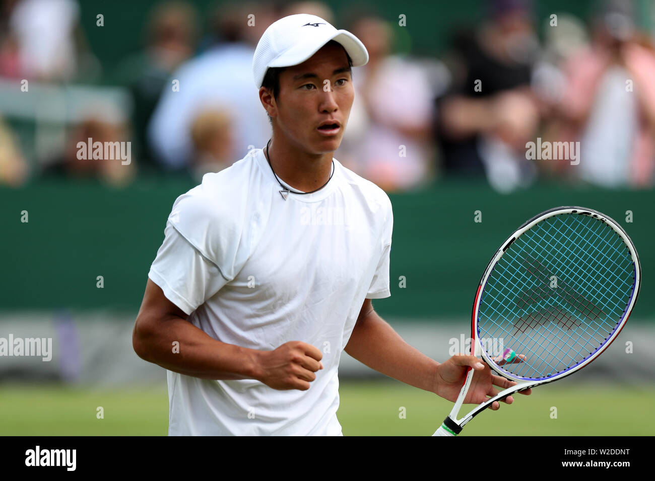 Ryoma Matsushita in action against Blu Baker in the boys singles on day ...