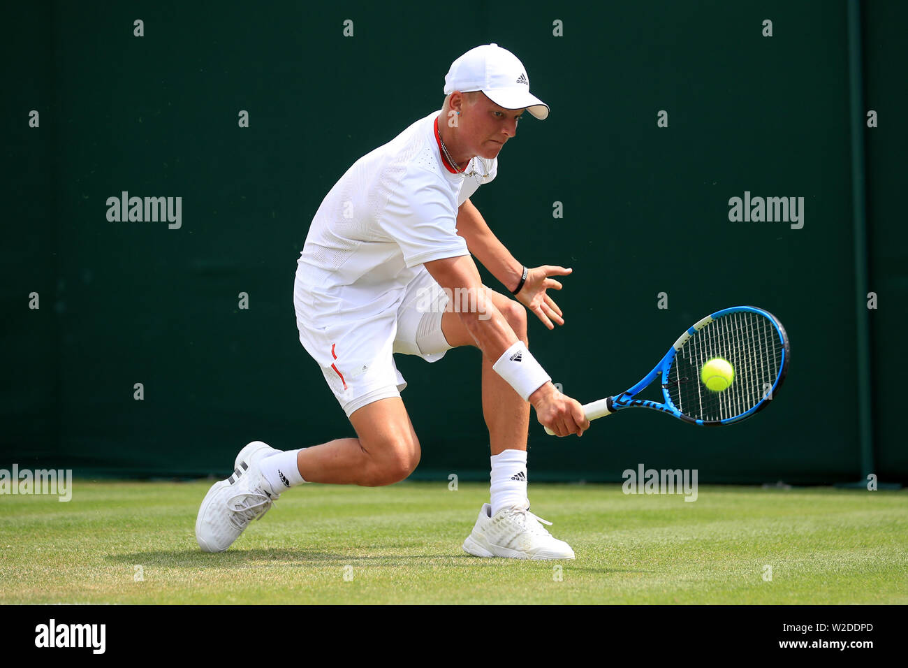 Blu Baker in action against Ryoma Matsushita in the boys singles on day ...