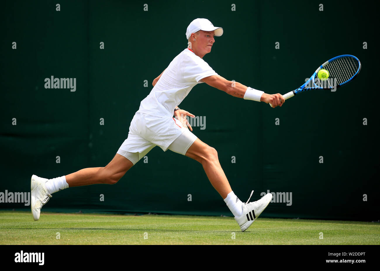 Blu Baker in action against Ryoma Matsushita in the boys singles on day ...