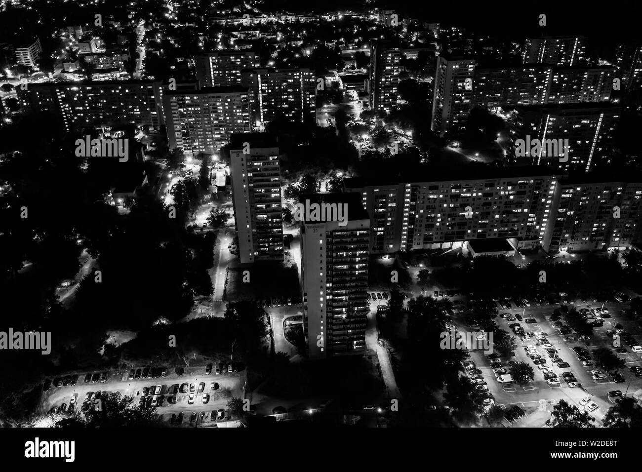 Aerial view of Warsaw at night with illuminated avenues converging ...