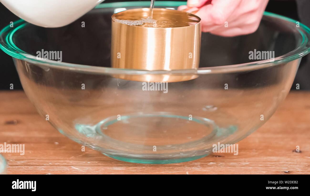 Step by step. Mixing organic ingredients in the glass bowl to bake ...