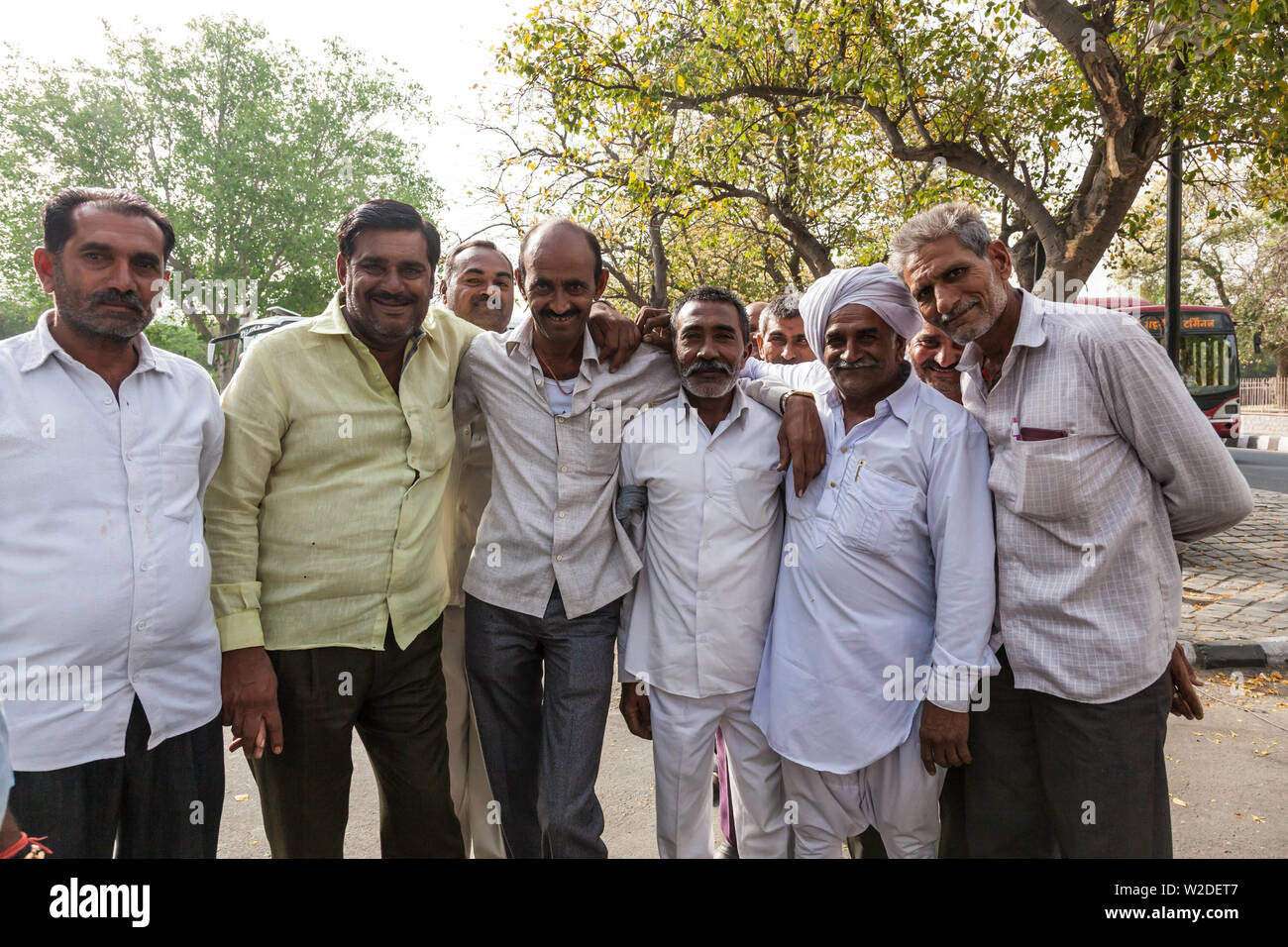Street scenes in India with people bagging and smiling, selling ...