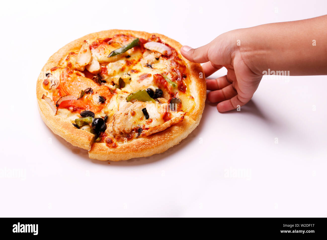 hand holding slice pizza isolate on white background Stock Photo - Alamy