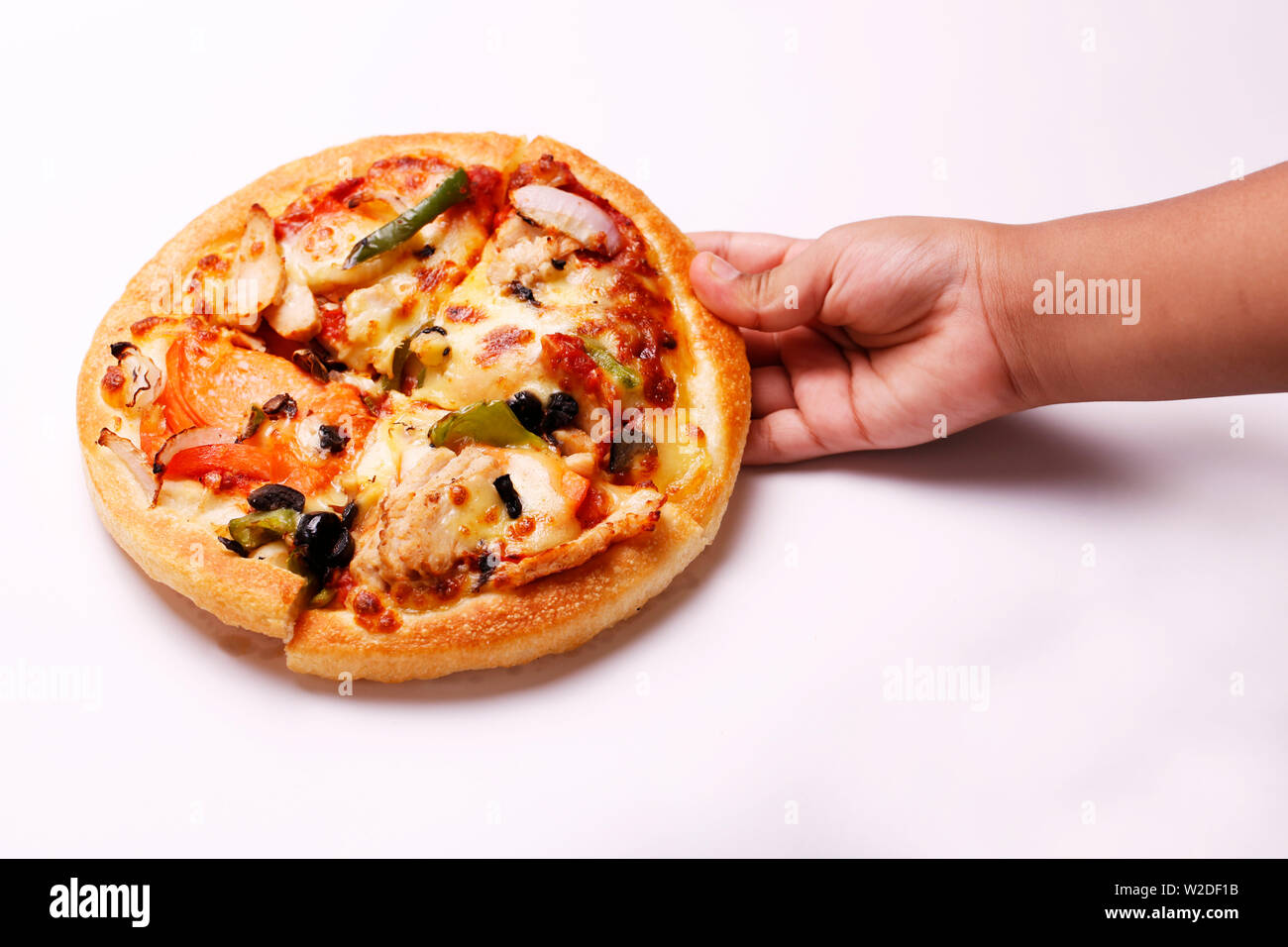 hand holding slice pizza isolate on white background Stock Photo - Alamy