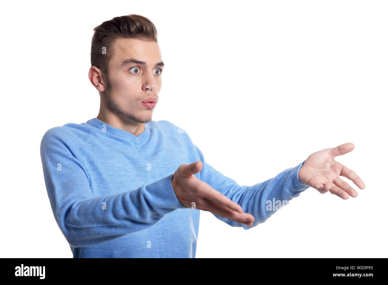 Portrait of handsome surprised man posing isolated Stock Photo - Alamy