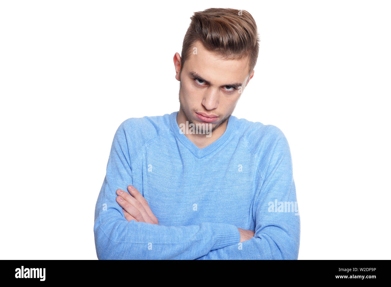 Portrait of handsome tired man posing on white background Stock Photo ...