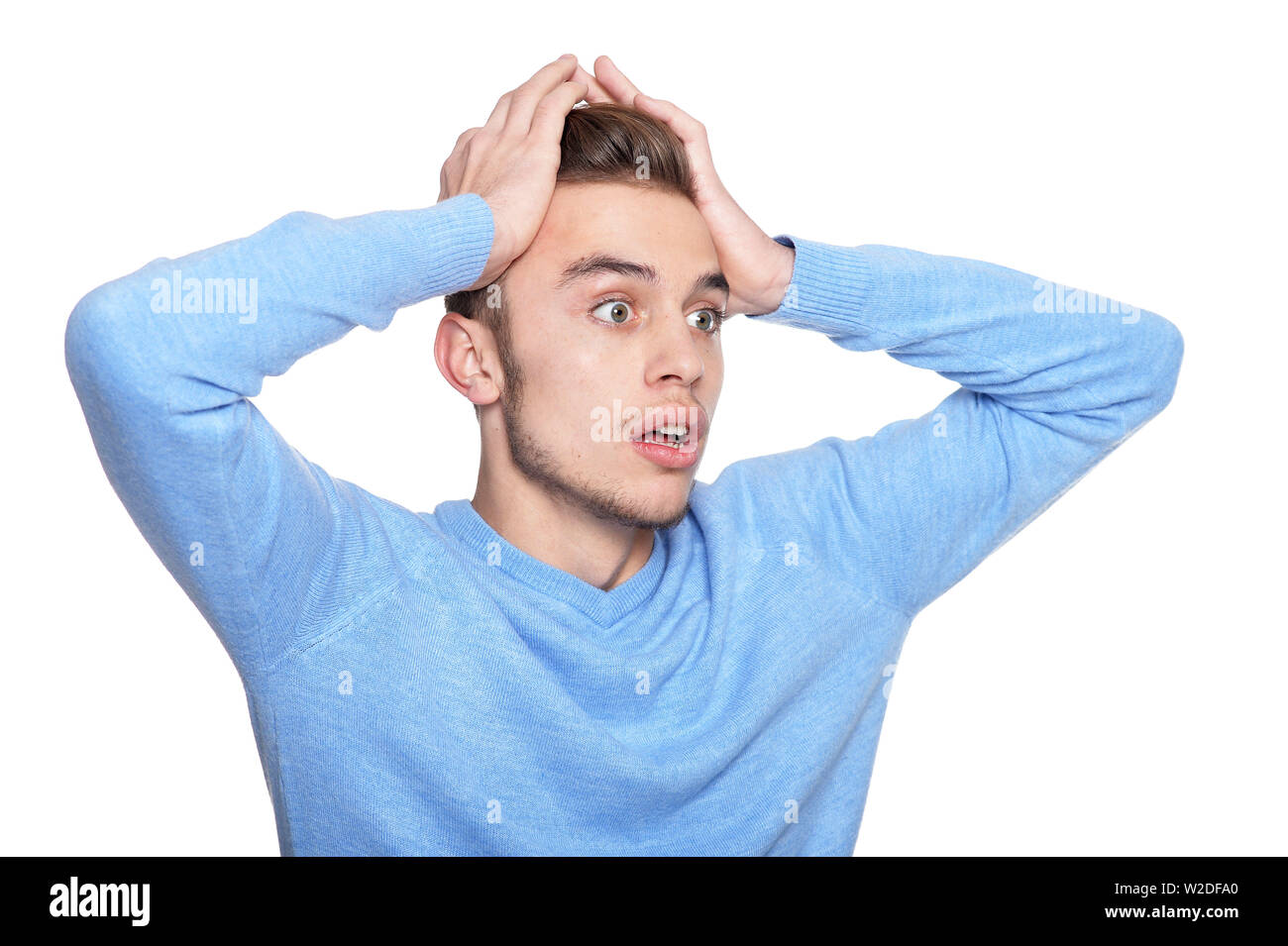 Portrait of handsome surprised man posing isolated Stock Photo - Alamy