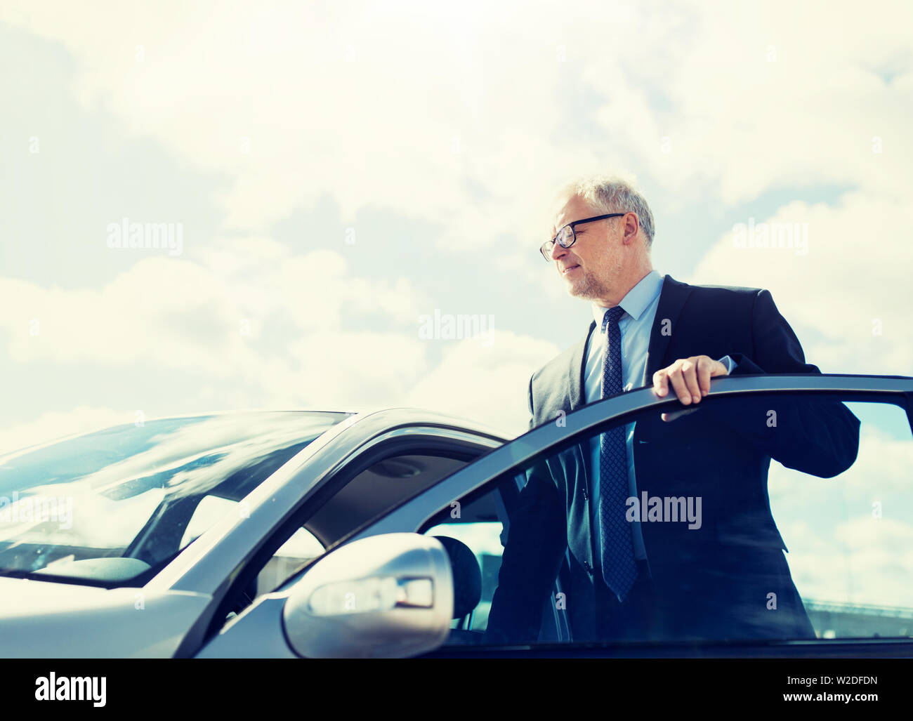 Getting into car hi-res stock photography and images - Alamy