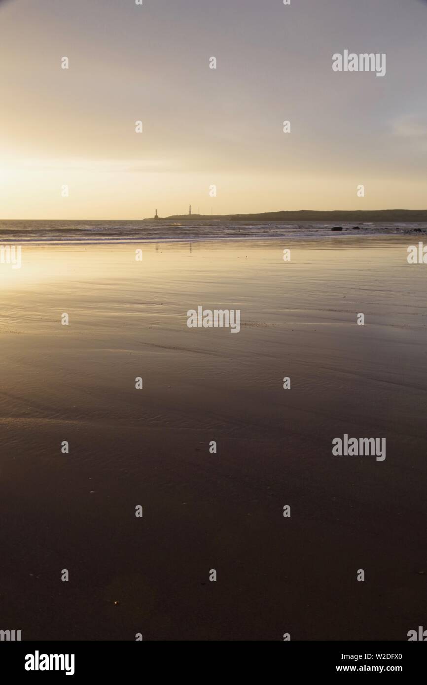 Sunrise Reflected in the Wet Sand of Aberdeen Beach at Low Tide ...