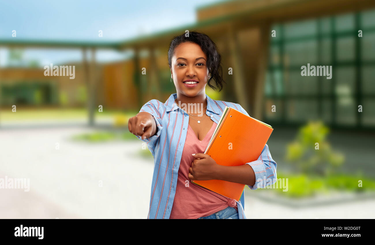 african american student woman with notebooks Stock Photo - Alamy