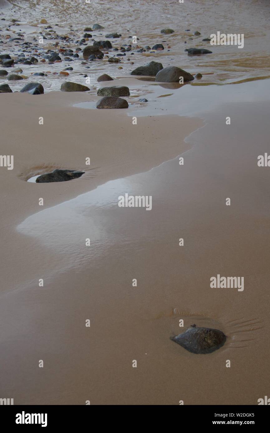 Rounded boulder on a beach hi-res stock photography and images - Alamy