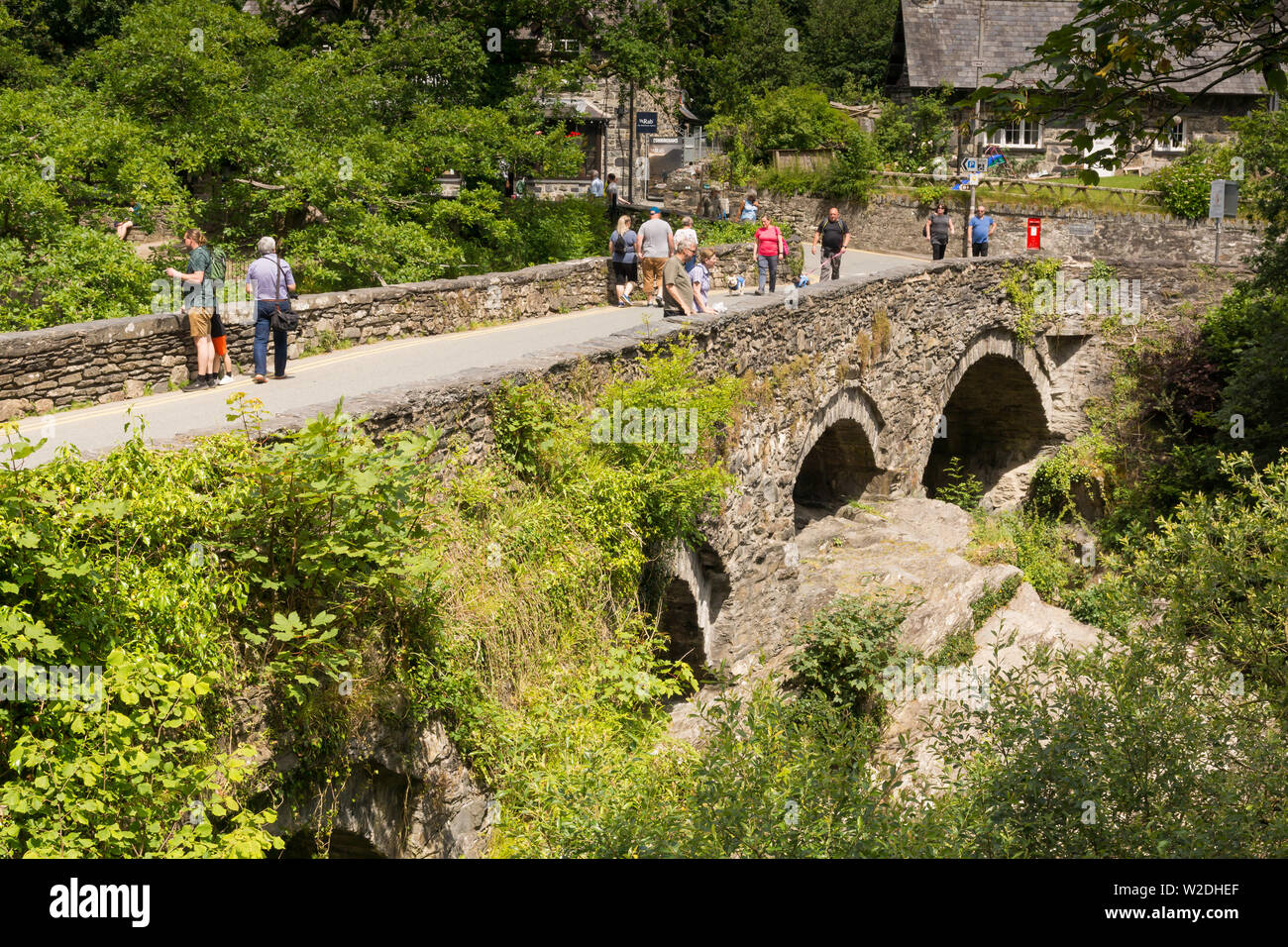 The medieval Pont-y-Pair Bridge or Bridge of the Cauldron over the ...