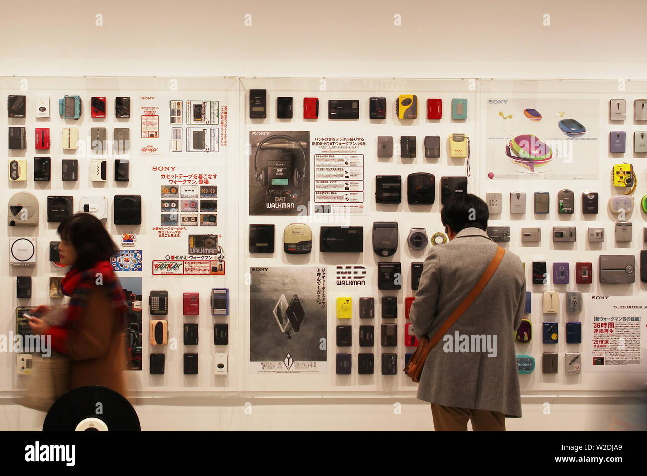 A display case with different models of Sony Walkman at an exhibition ...