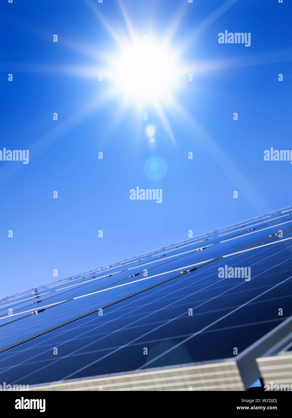 Sun over blue solar panel. Renewable, alternative solar energy, sun ...