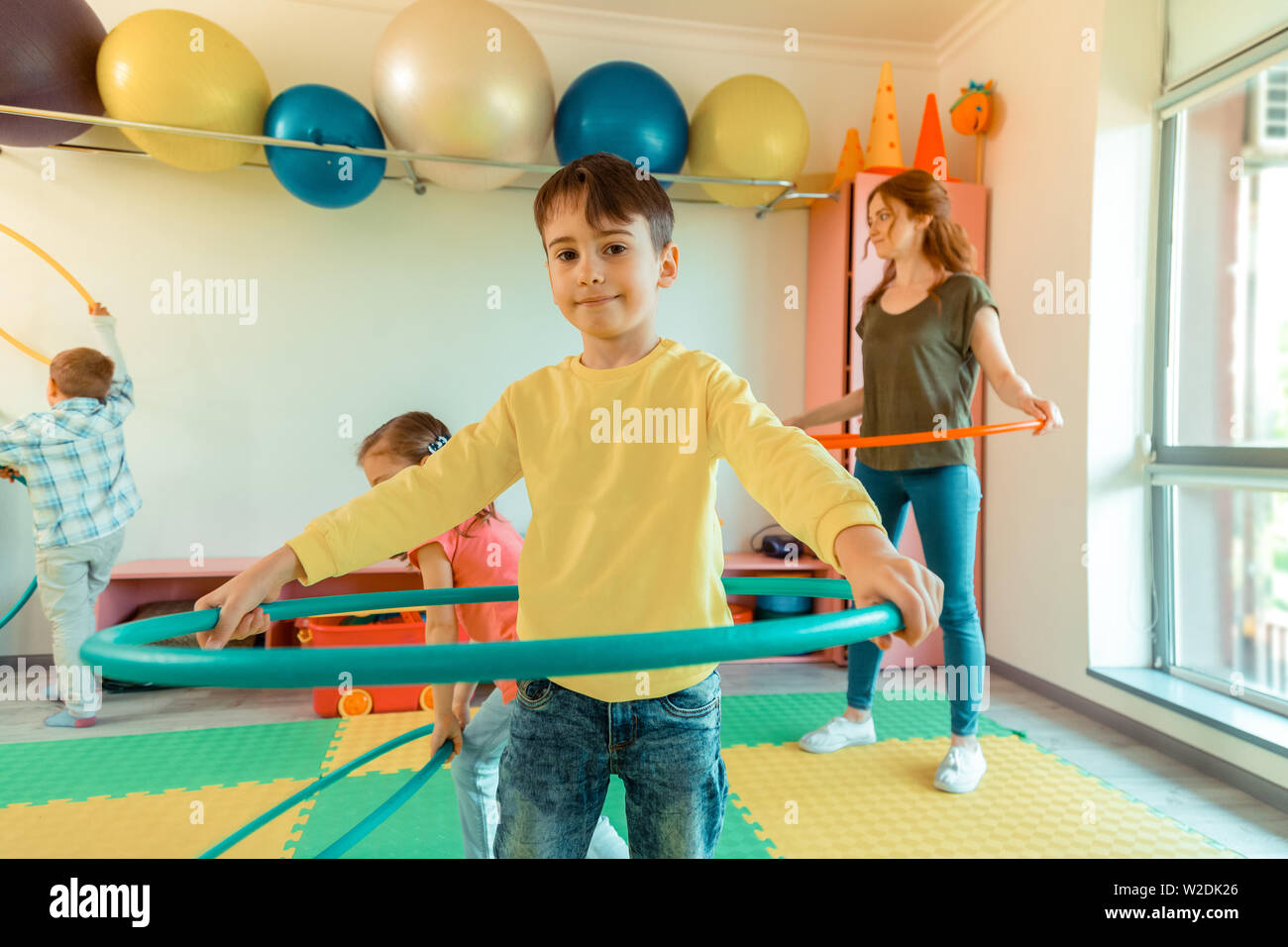 Gymnastics coach boy hi-res stock photography and images - Alamy