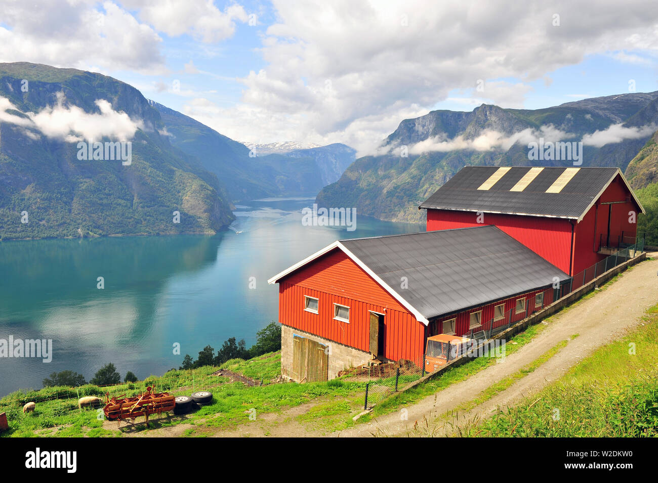 Beautiful red farm house on Sognefjord, Norway Stock Photo - Alamy