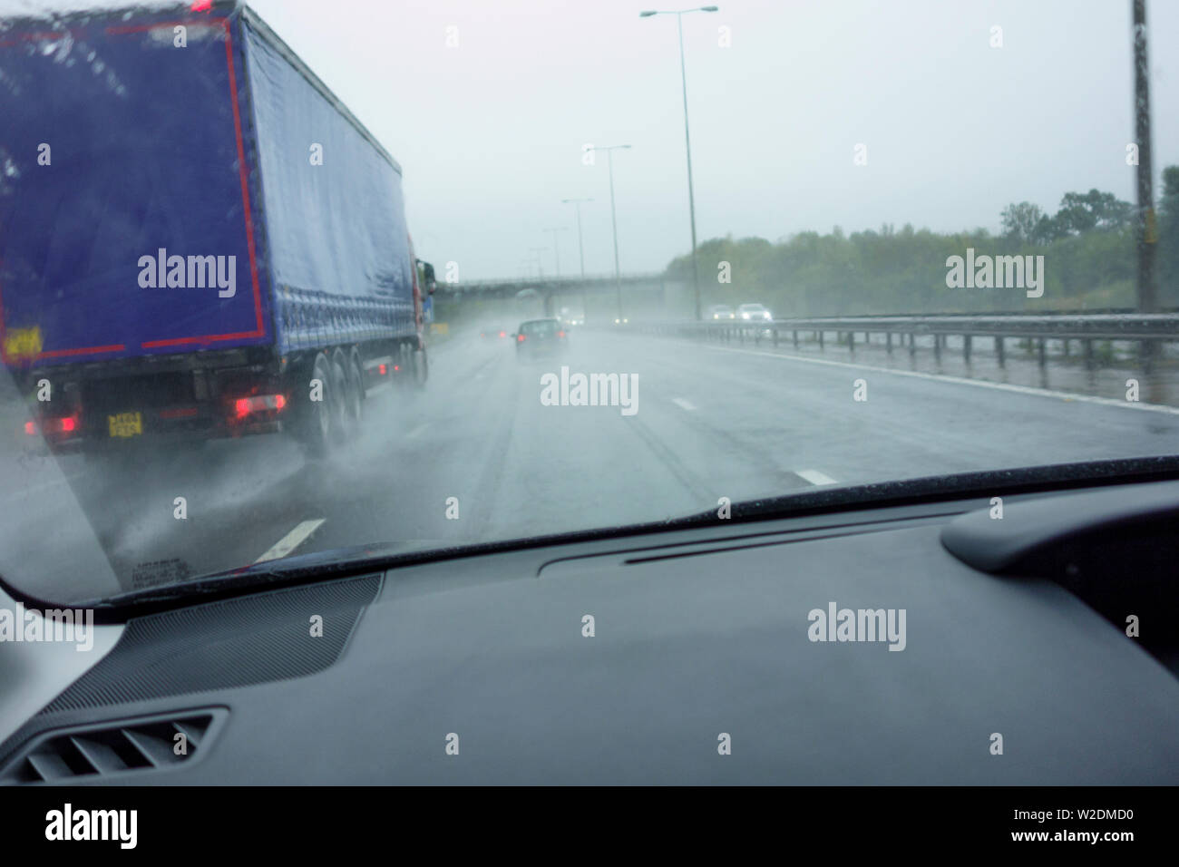 Treacherous road conditions on M5 with heavy rain, UK Stock Photo - Alamy